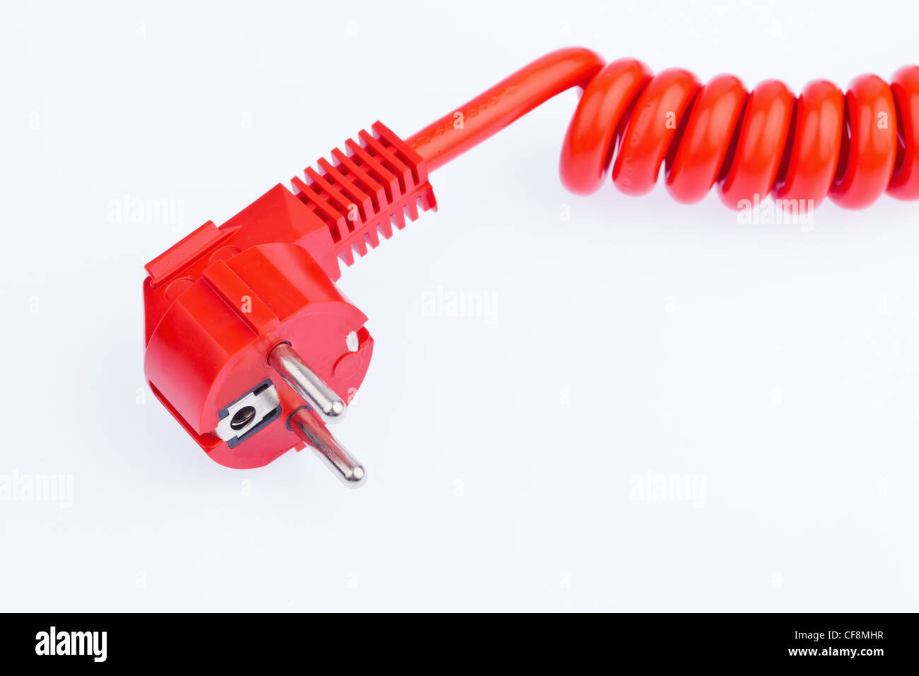 a red power cable with a connector located on a white background Stock ...