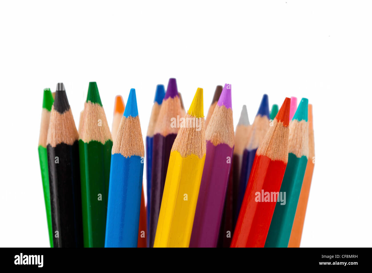 crayons many different colors in a glass Stock Photo - Alamy