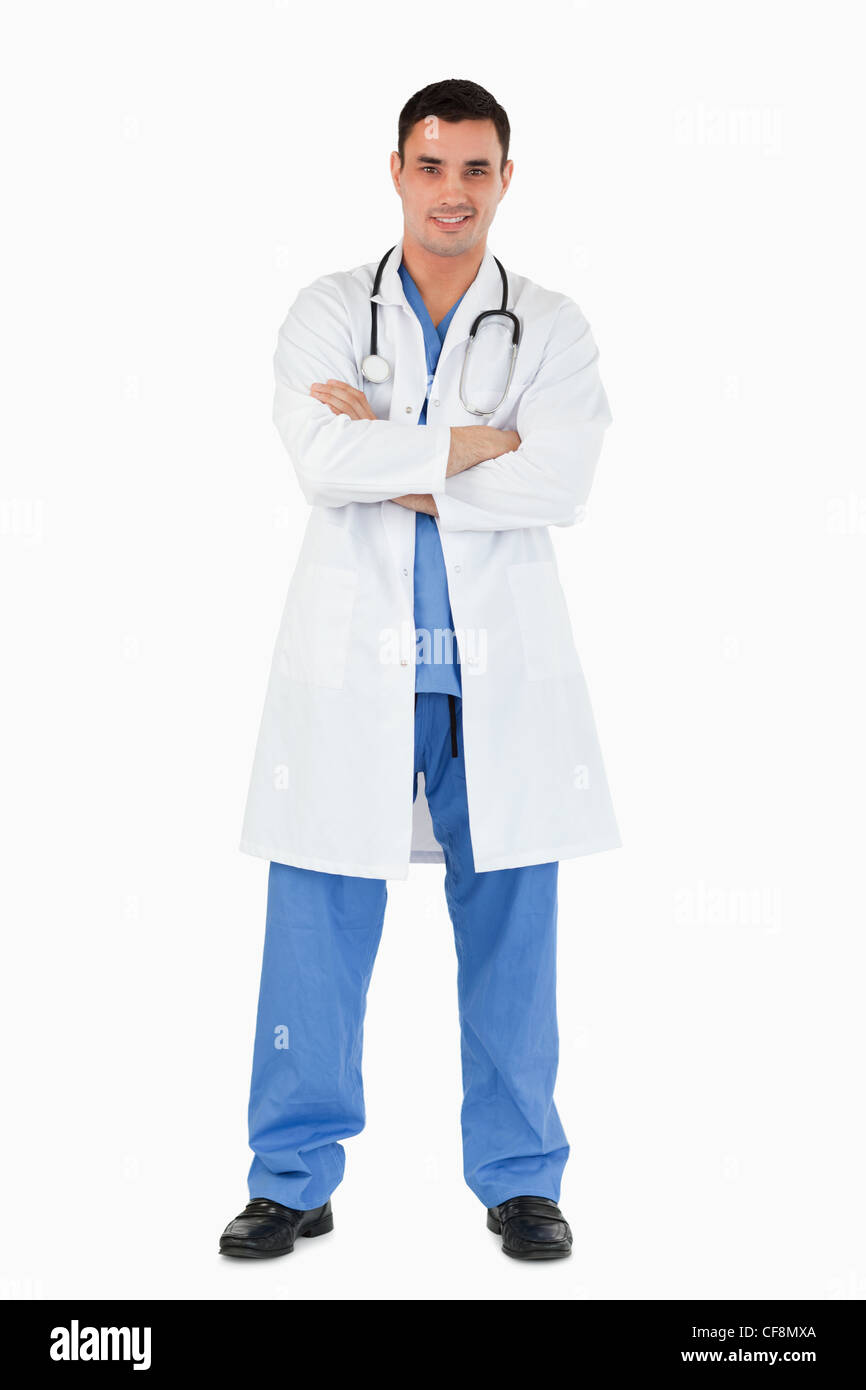 Portrait of a doctor standing up with the arms crossed Stock Photo - Alamy