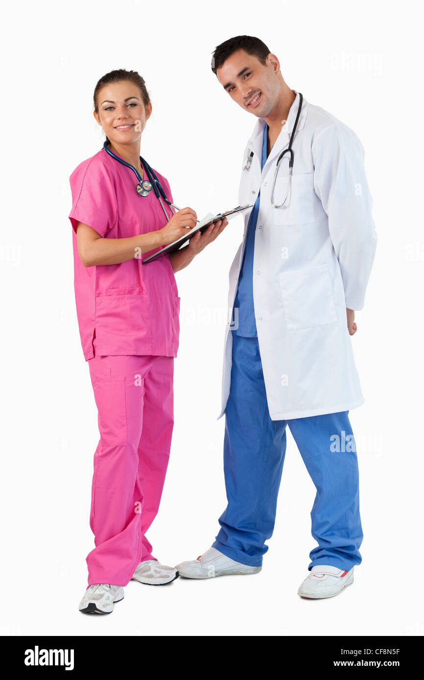 Female doctor clipboard talking Cut Out Stock Images & Pictures - Alamy