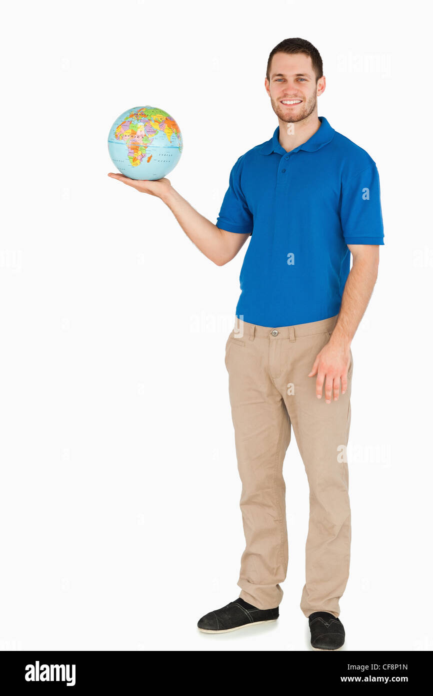 Smiling man displaying palm Cut Out Stock Images & Pictures - Alamy