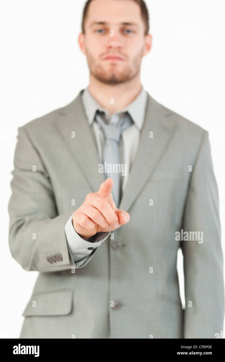 Finger of businessman pointing Stock Photo - Alamy