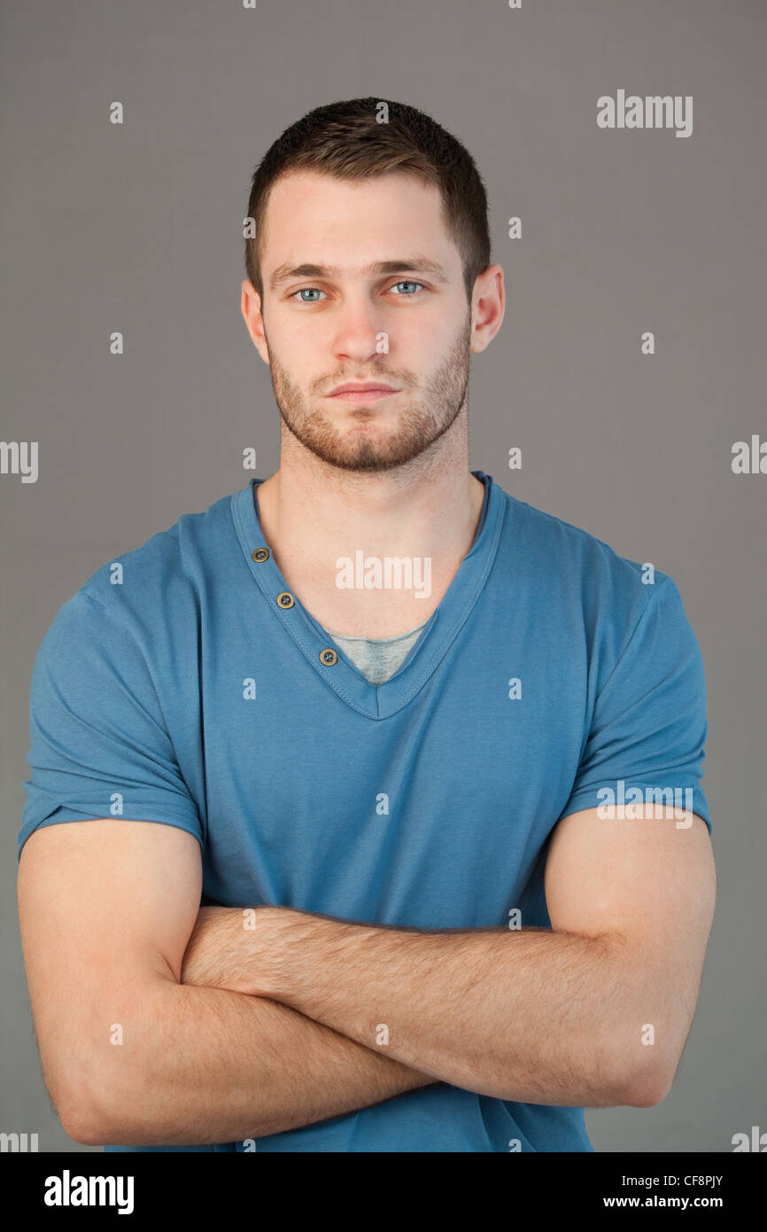 Male with arms folded Stock Photo - Alamy