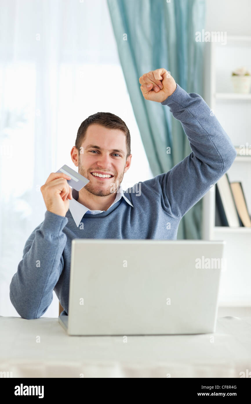 Man won an online auction Stock Photo - Alamy