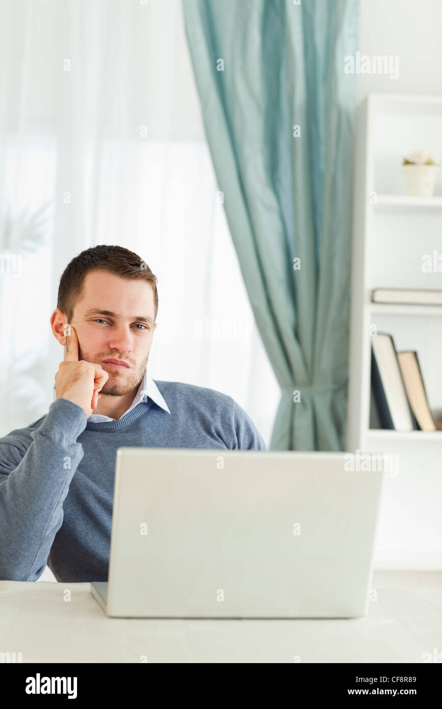 Businessman bored in his homeoffice Stock Photo - Alamy