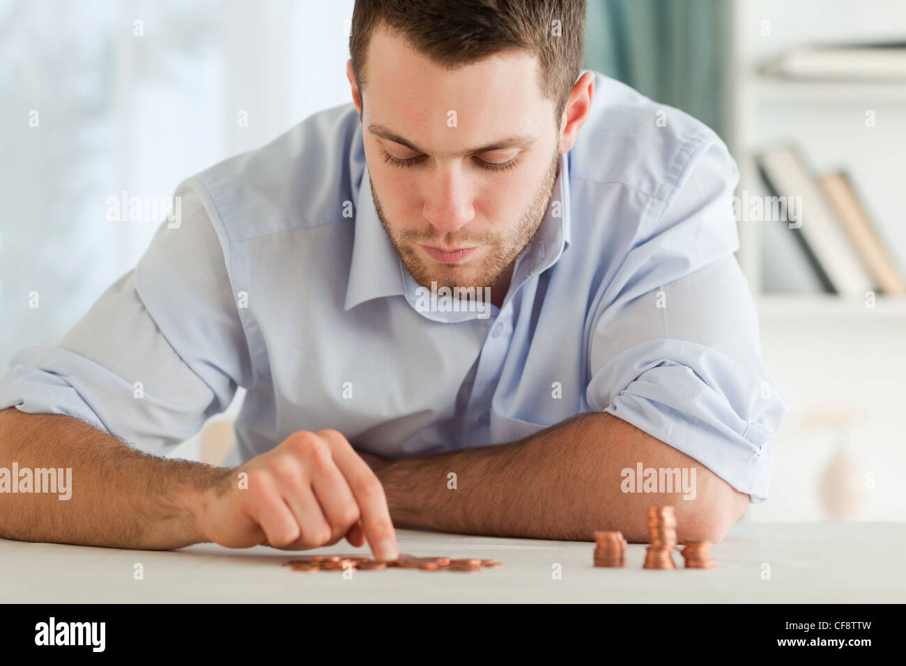 Counting money small change hi-res stock photography and images - Alamy