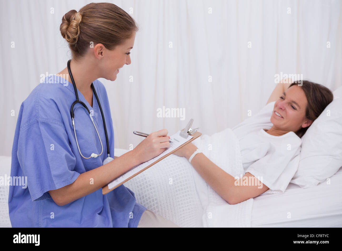 Patient questioning doctor hi-res stock photography and images - Alamy