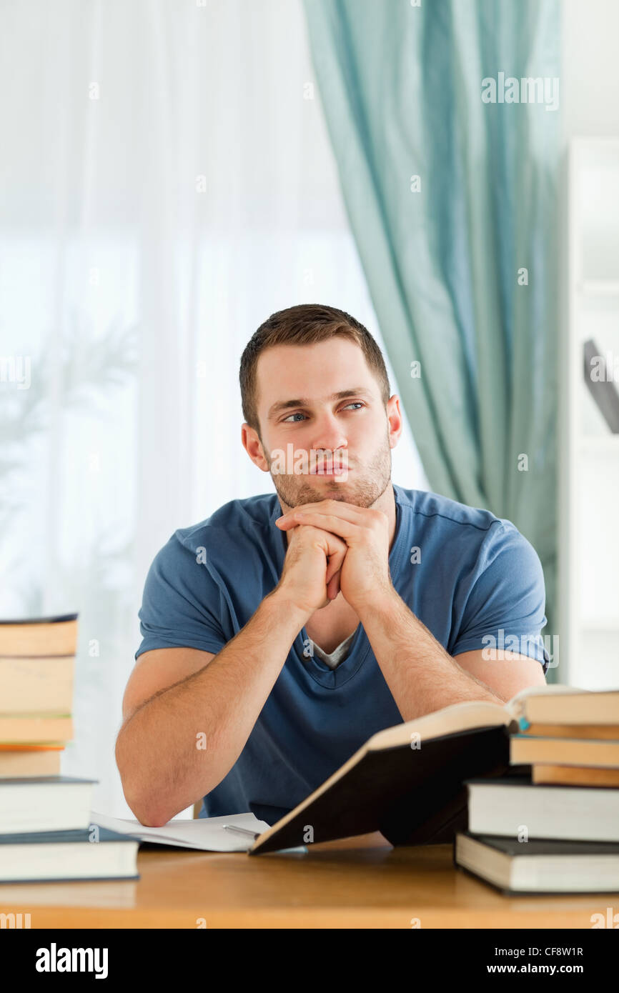 Student working on his book report Stock Photo - Alamy