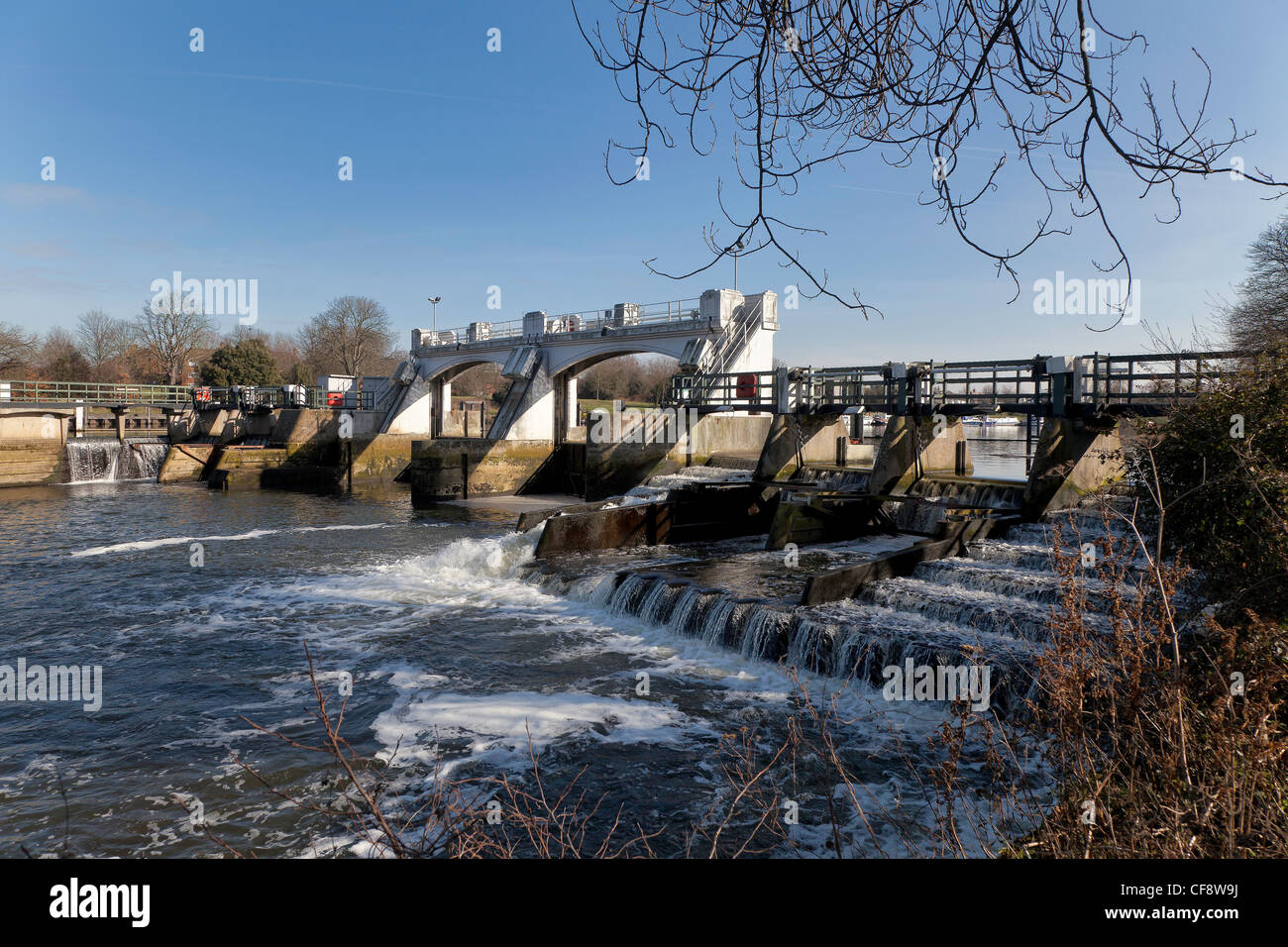 Teddington lock and weir on River Thames in early spring Stock Photo ...