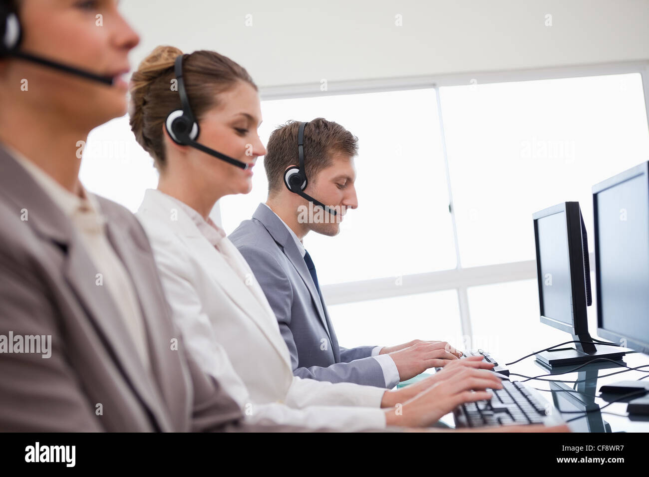 Side view of customer advisory service Stock Photo - Alamy