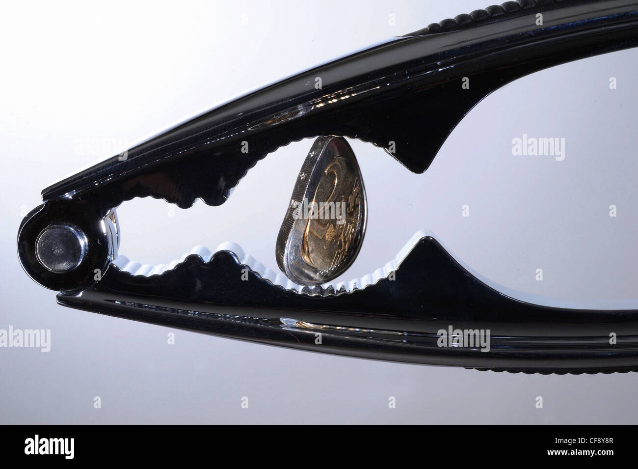 Bent coin hi-res stock photography and images - Alamy