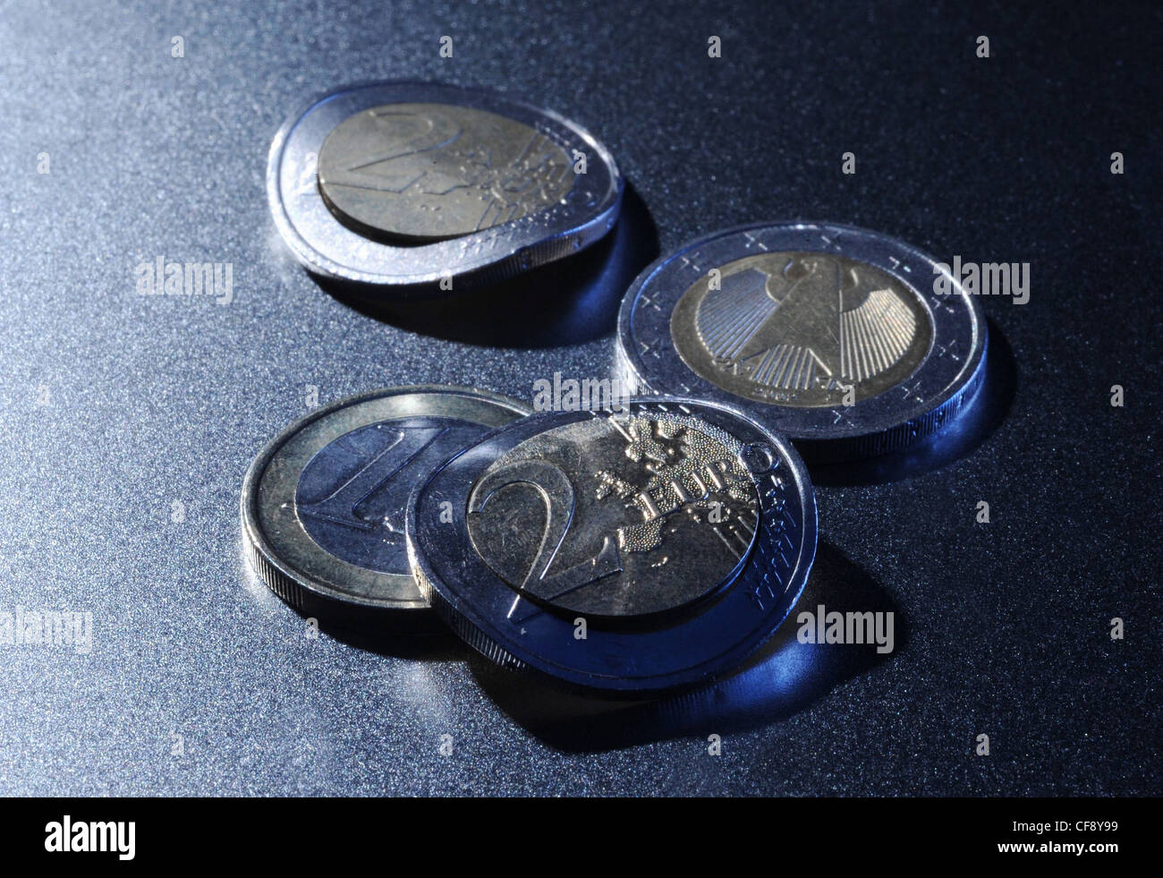 Bent coin hi-res stock photography and images - Alamy
