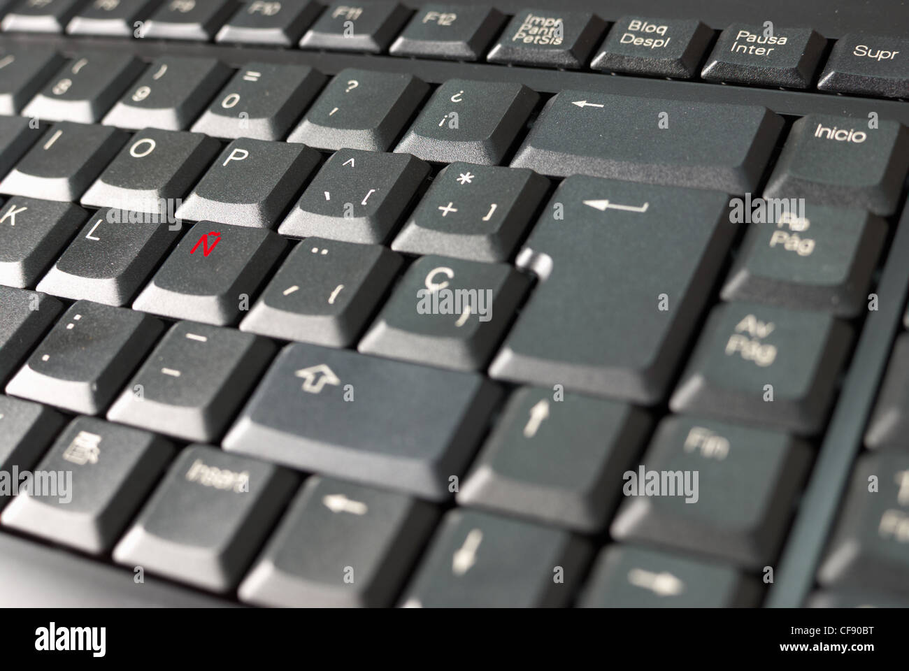 Spanish language keyboard with its distinctive letter highlighted in ...