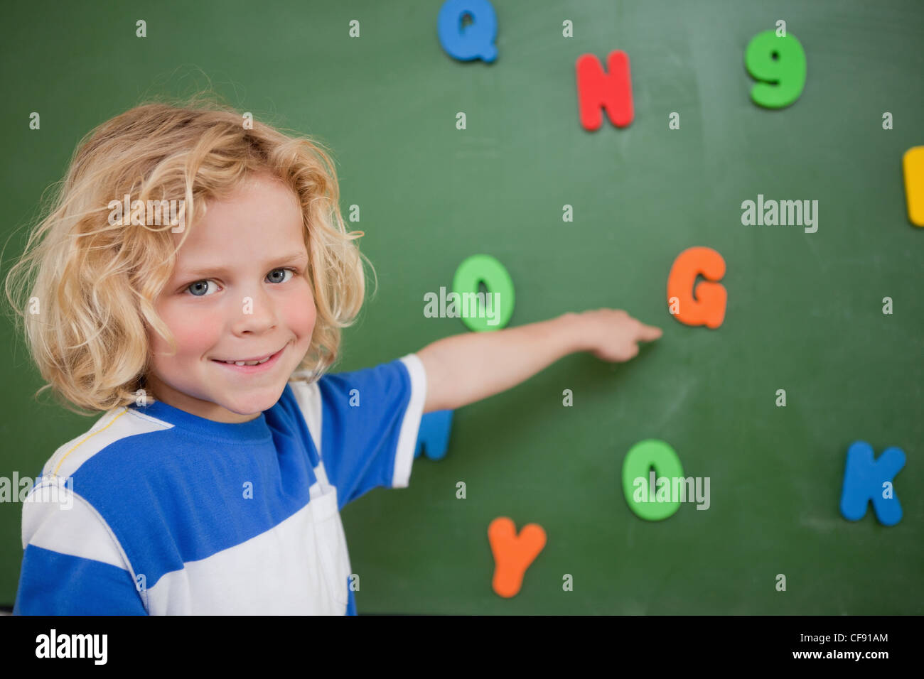 Finger pointing at letter hi-res stock photography and images - Alamy