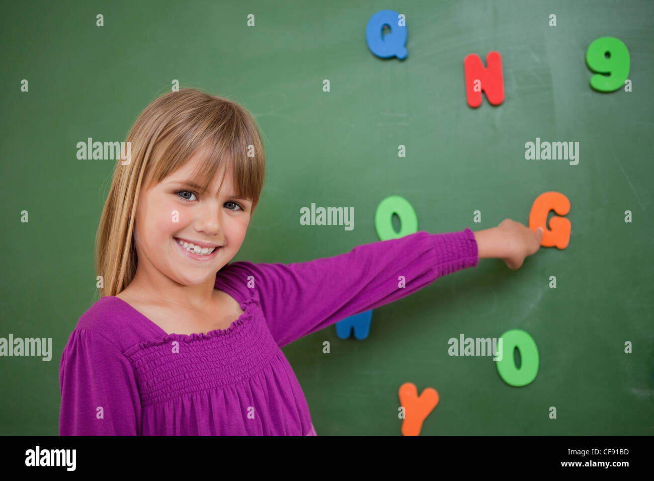 Finger pointing at letter hi-res stock photography and images - Alamy