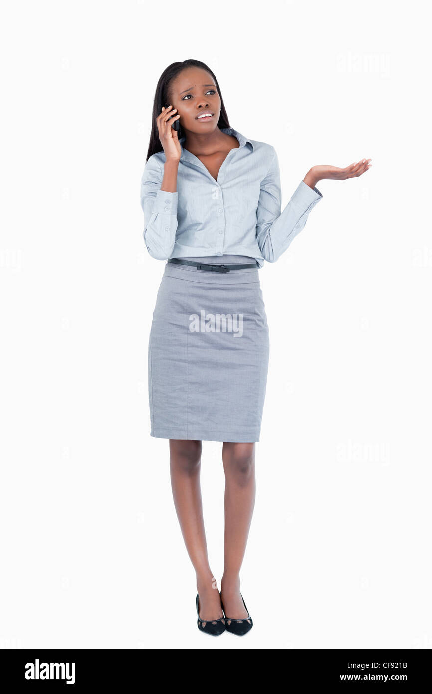 Woman making call gesture holding hi-res stock photography and images ...