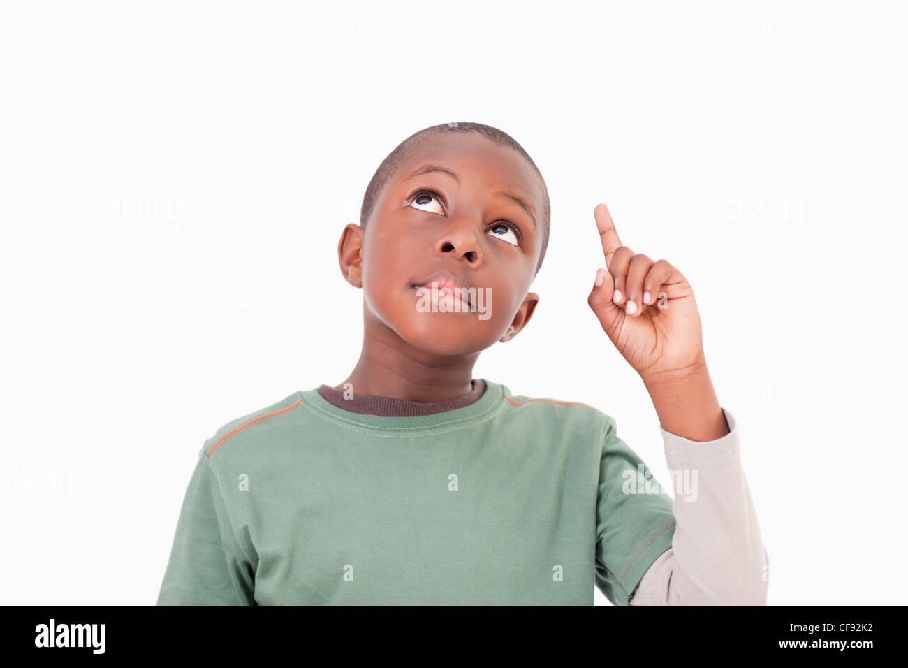 Boy pointing at something above him Stock Photo - Alamy