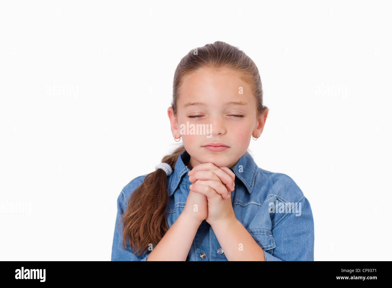 Little girl praying Stock Photo - Alamy