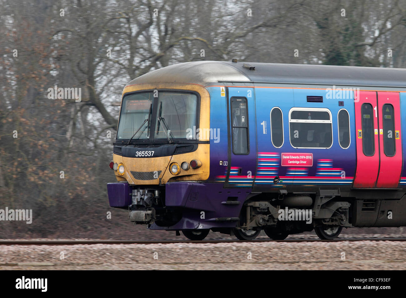 Local train Milton level crossing Cambridgeshire Stock Photo - Alamy