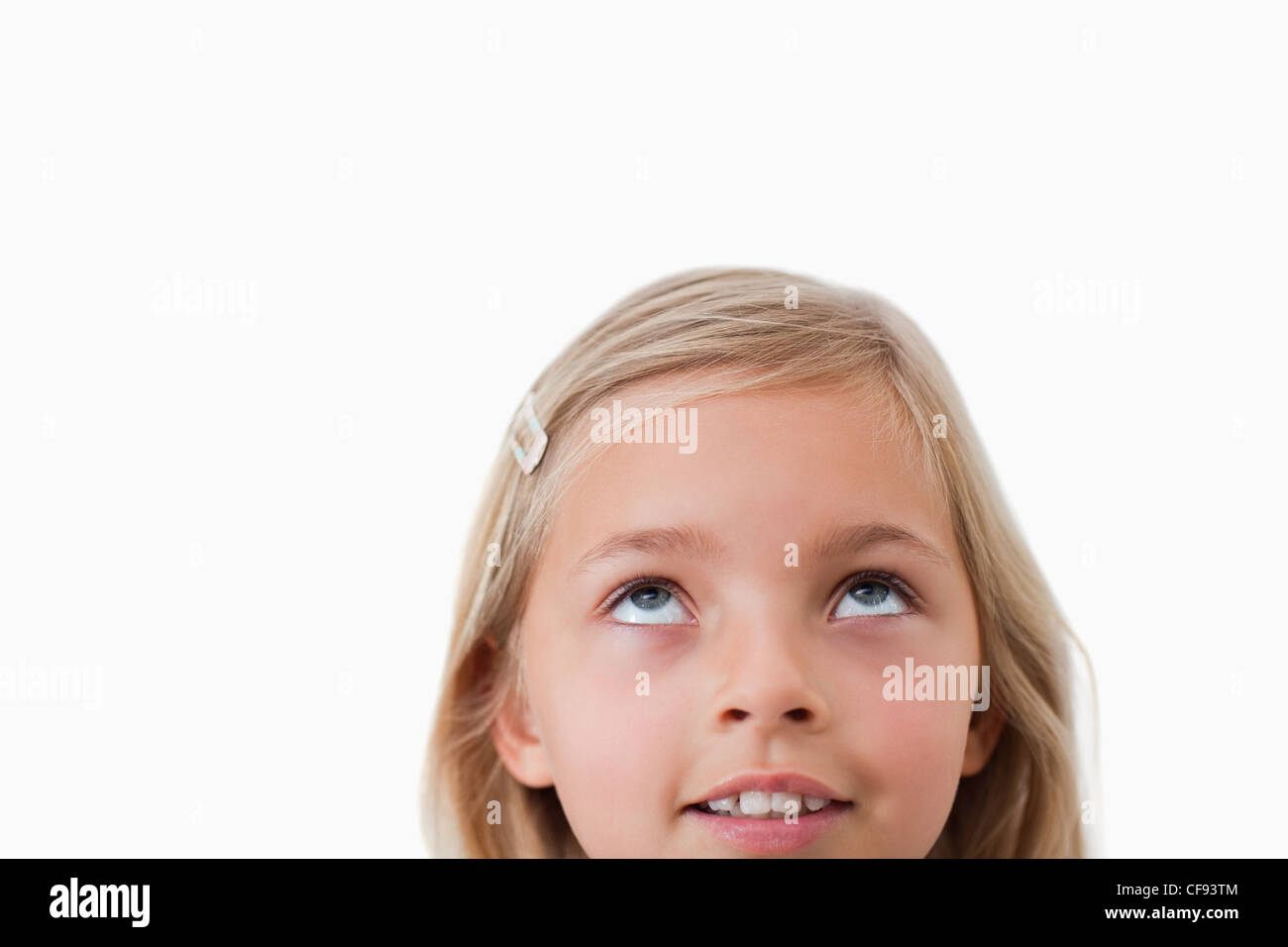 Happy girl looking up Stock Photo - Alamy