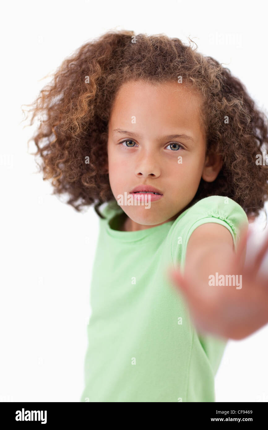 Portrait of a girl saying stop with her hand Stock Photo - Alamy