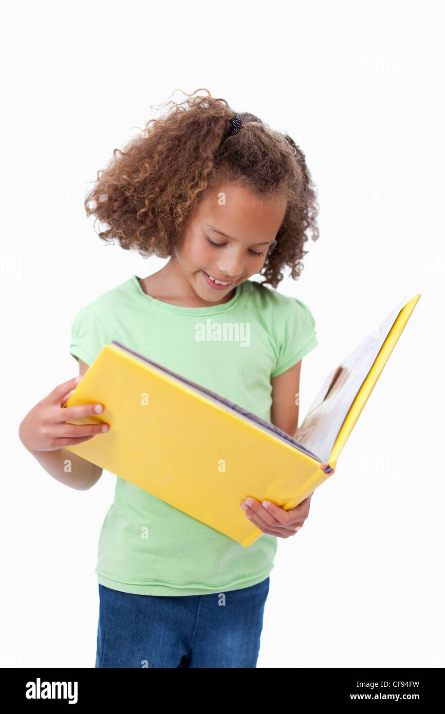 Portrait of a girl reading a fairy tale Stock Photo - Alamy