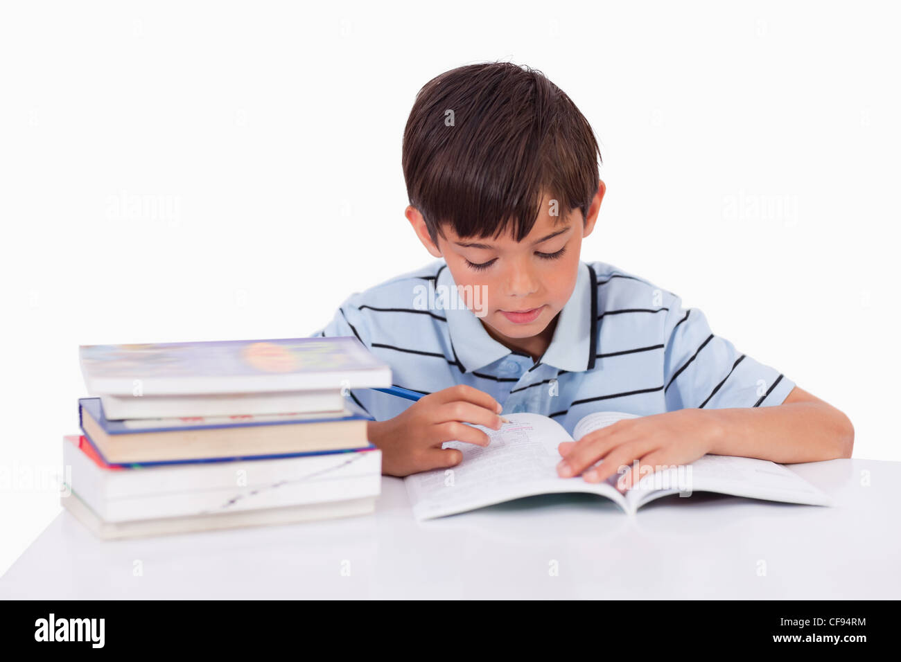 Boy learning his lessons Stock Photo - Alamy