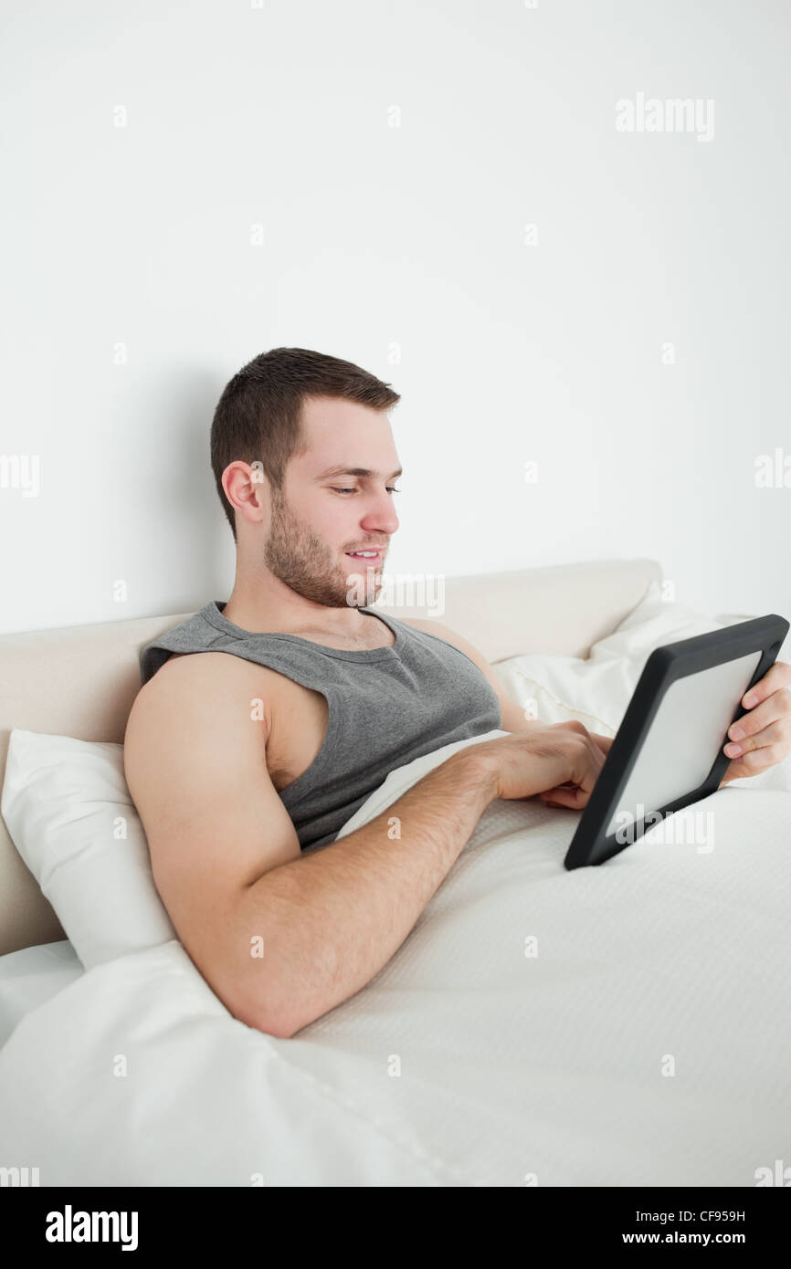 Portrait of a man using a tablet computer Stock Photo - Alamy