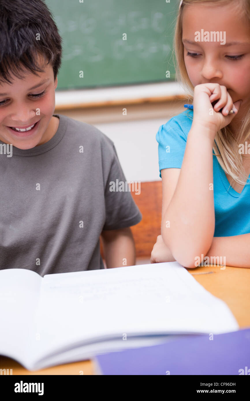 Portrait of pupils working together Stock Photo - Alamy