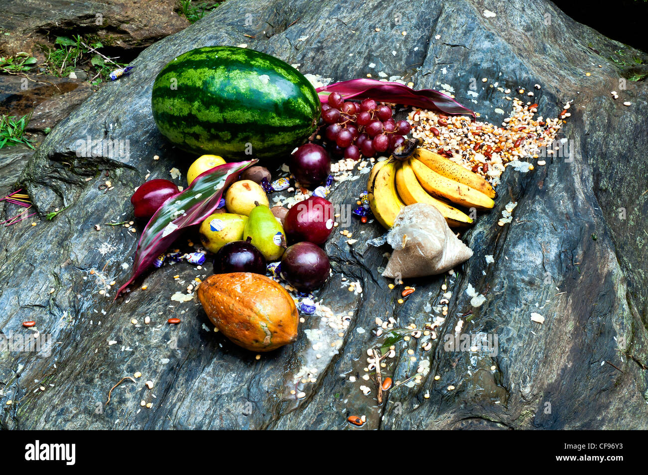 Maracas Falls considered a sacred place, the rocks have candle stubs or ...