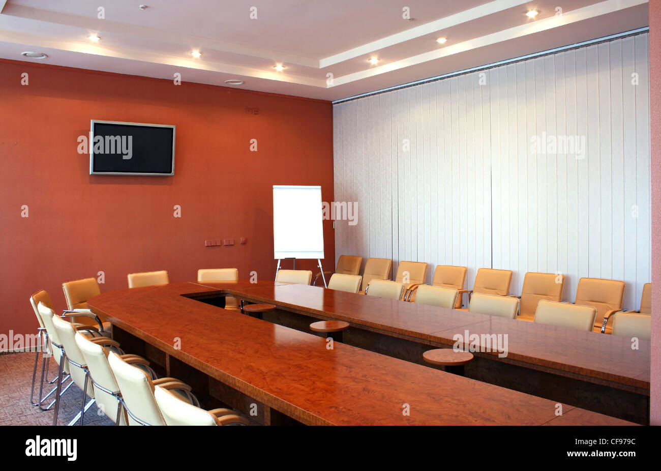 Long table for meetings with the chairs around the perimeter Stock ...
