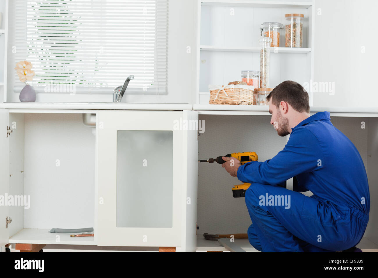 Fixing door hi-res stock photography and images - Alamy