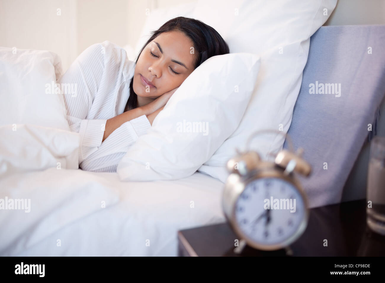 Side view of woman sleeping Stock Photo - Alamy