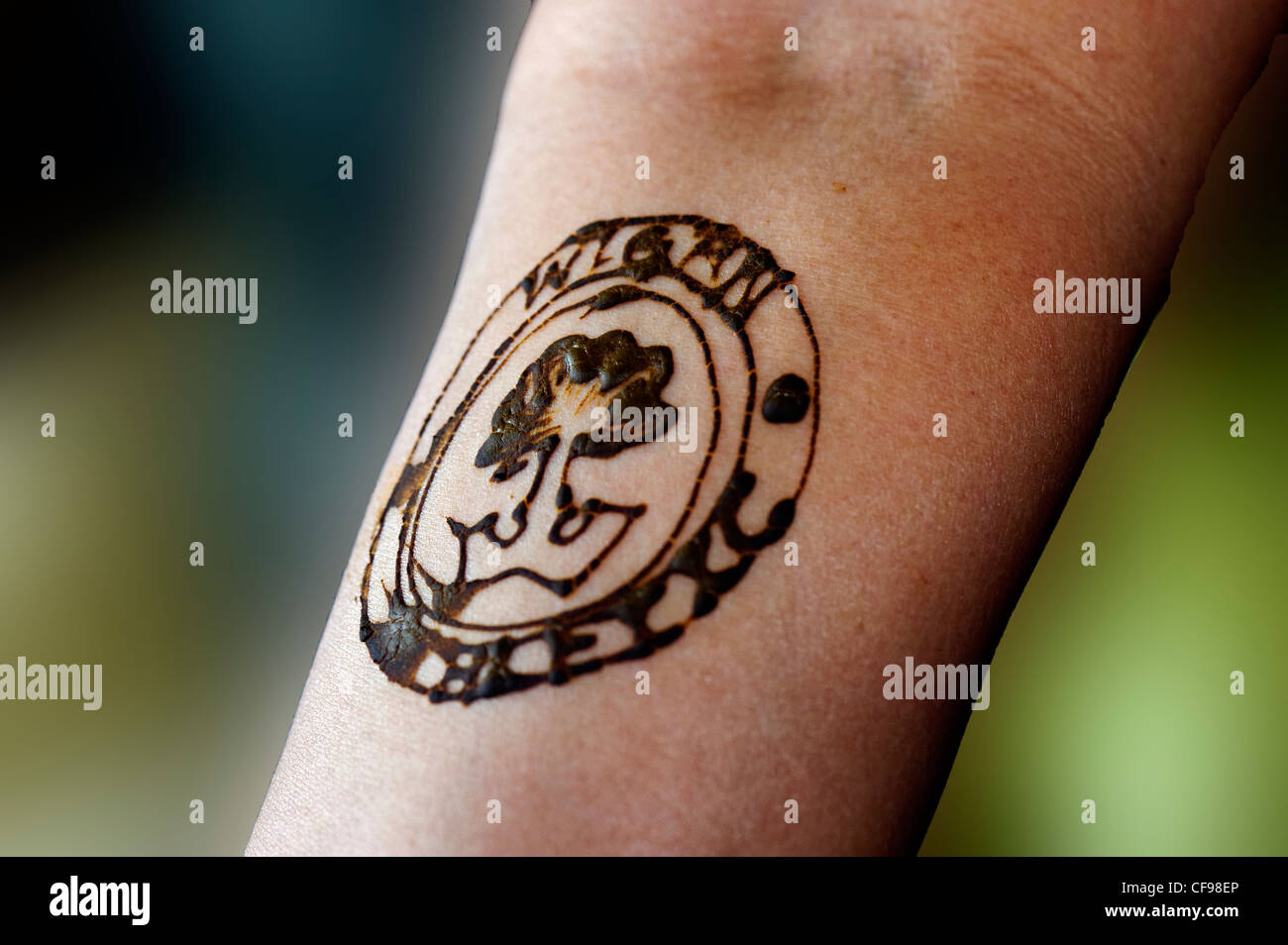 Crest henna woman arm football hi-res stock photography and images - Alamy