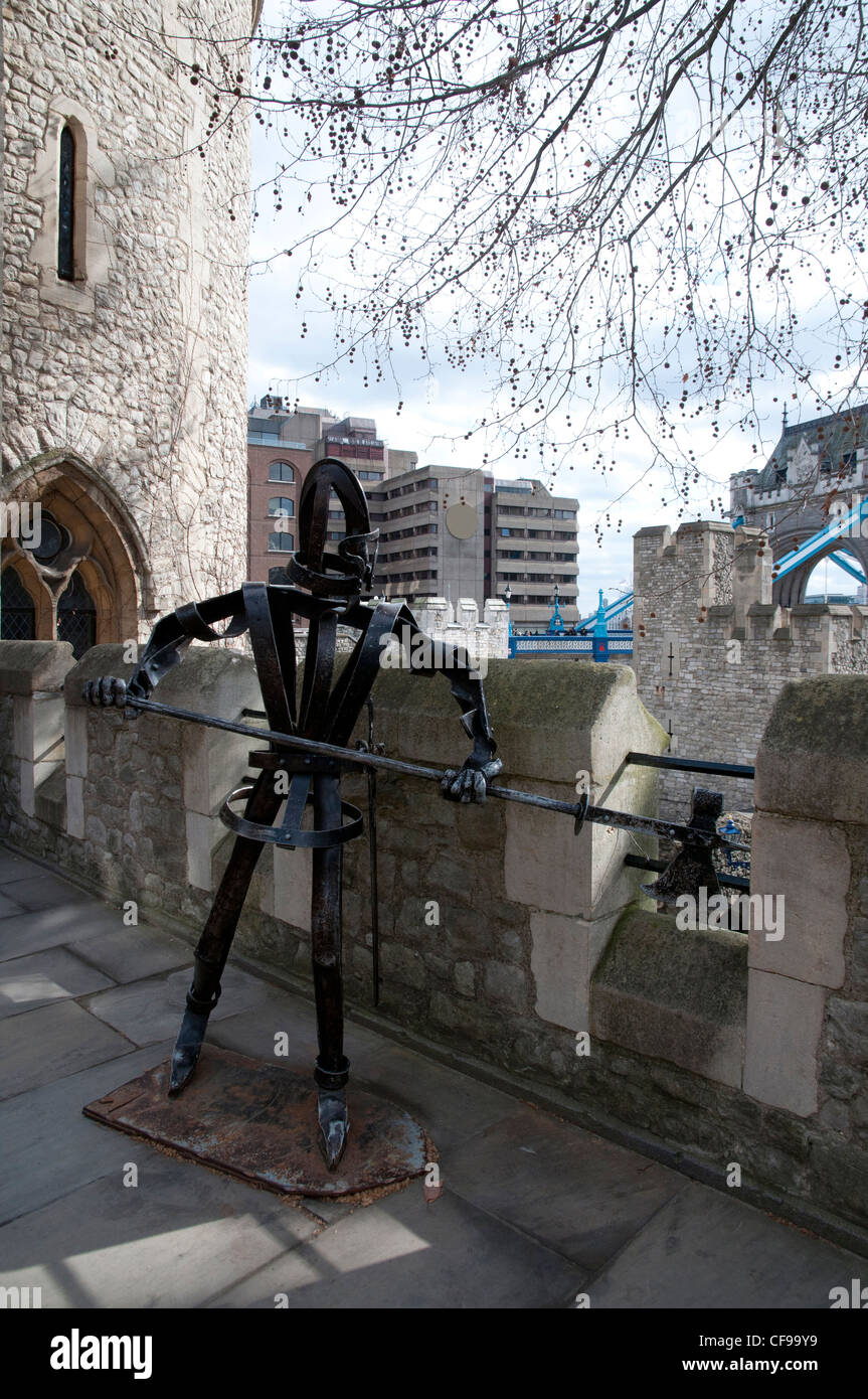 There is a modern artwork, a statue of a crossbowman, a solider with a ...