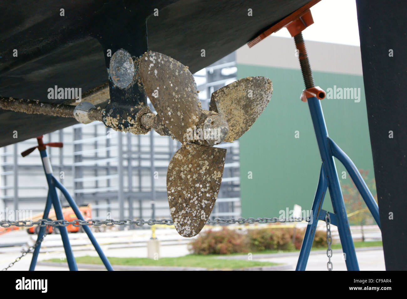 Three blade marine propeller in need of cleaning and maintenance ...