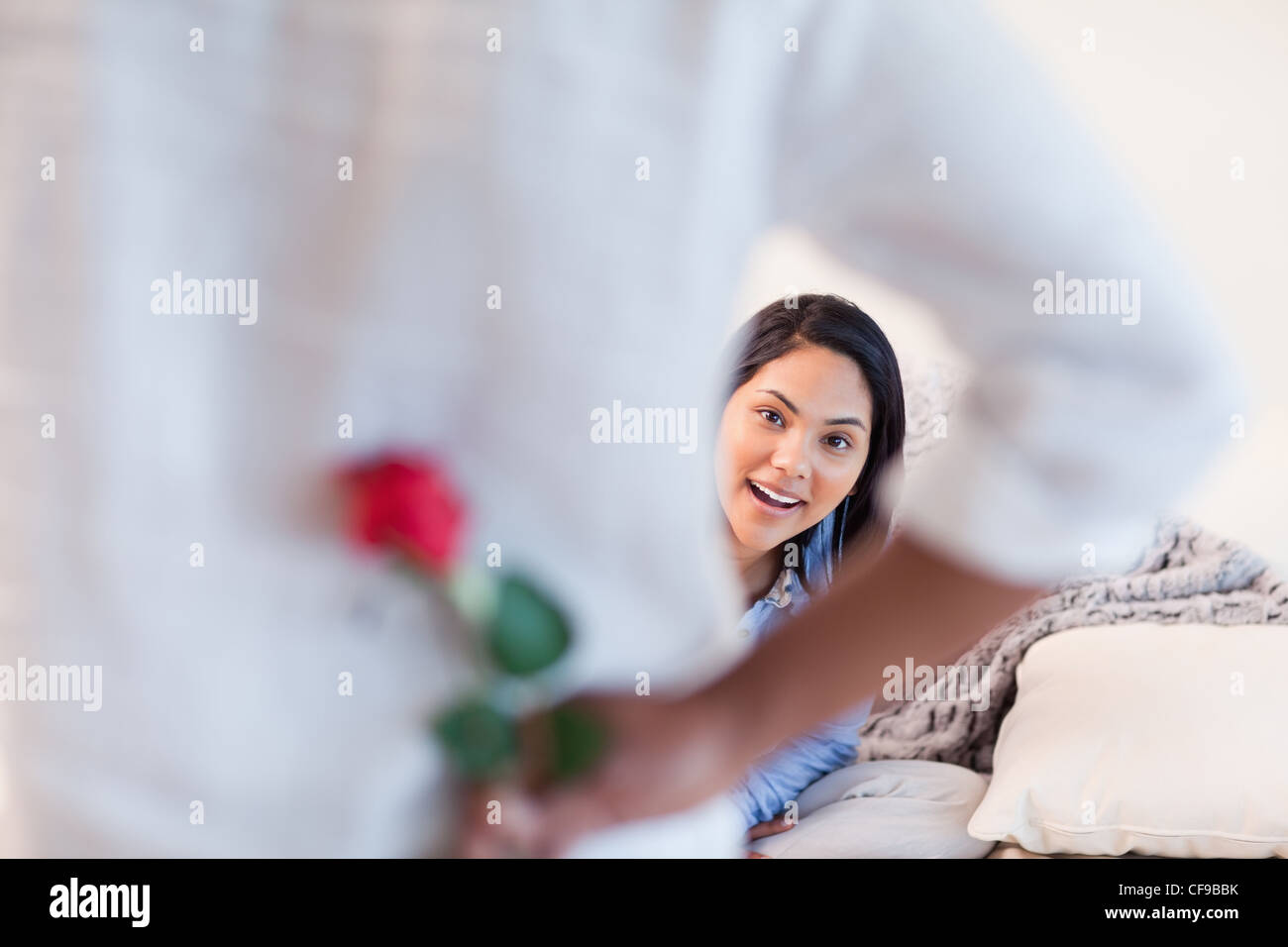 Female about to get a rose by her boyfriend Stock Photo - Alamy
