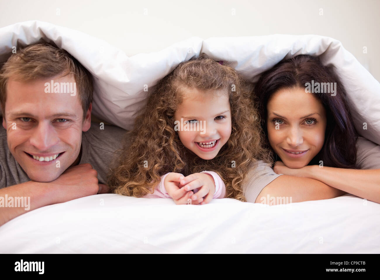 Hiding under bed man woman hi-res stock photography and images - Alamy