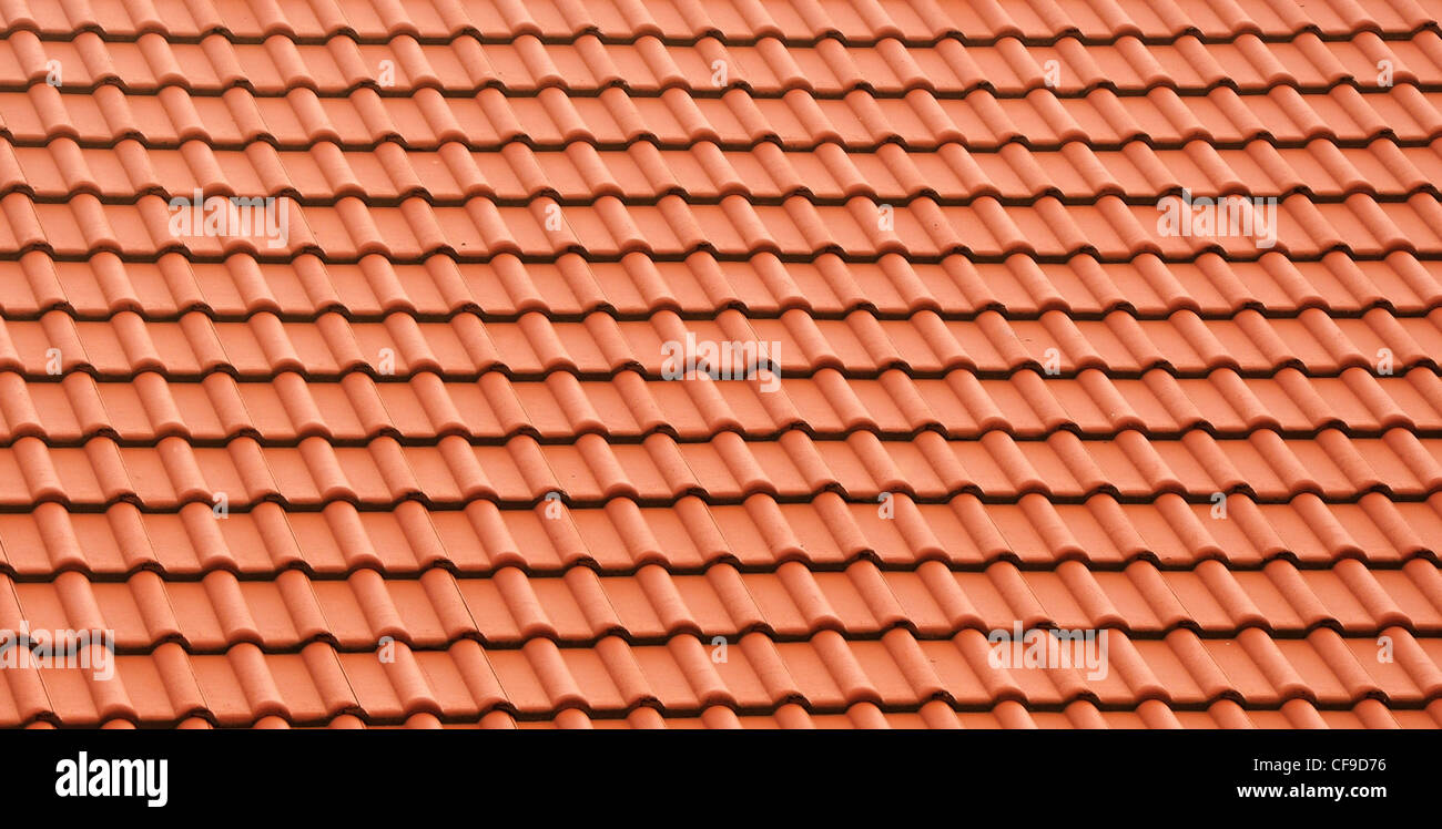 Abstract orange roof tile background Stock Photo - Alamy