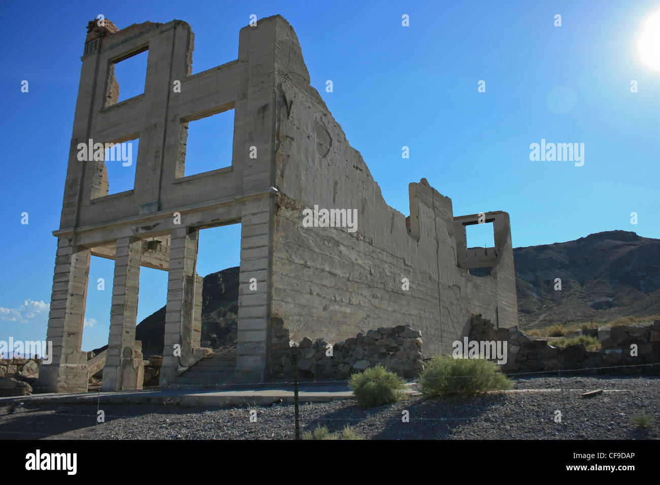 A crumbling, ruined building in Rhyolite, ghost town, Death Valley ...