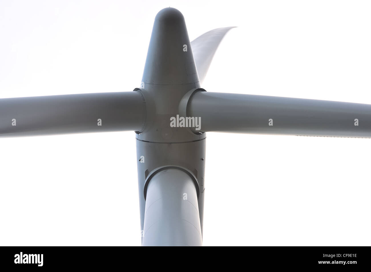 Underneath a wind turbine as the blades swish past overhead Stock Photo ...