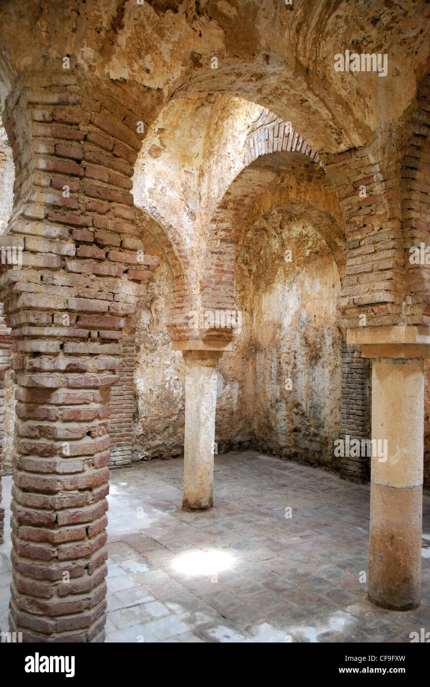 Arches and columns inside the Arab baths, Ronda, Malaga Province ...