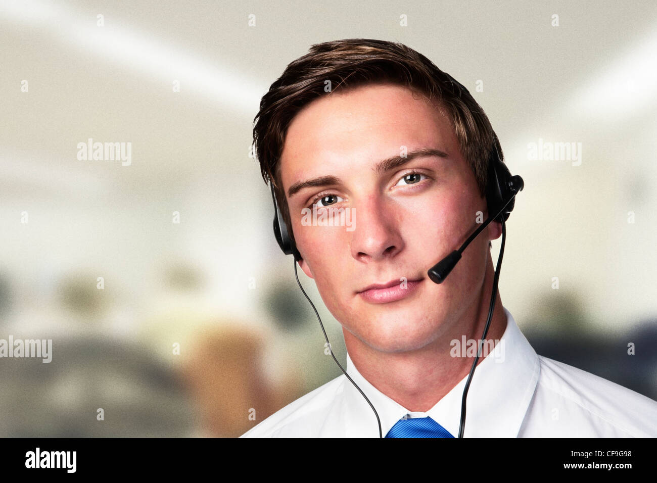 business man in a shirt making a call on the phone wear a head set ...