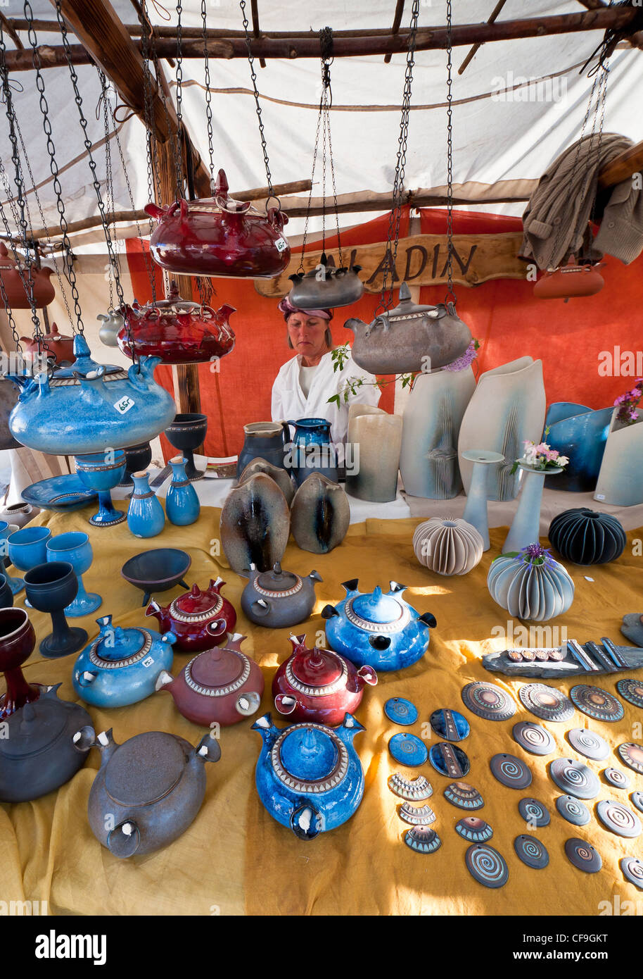 Pot seller exposing her goods at the medieval festival in Zurich Stock ...