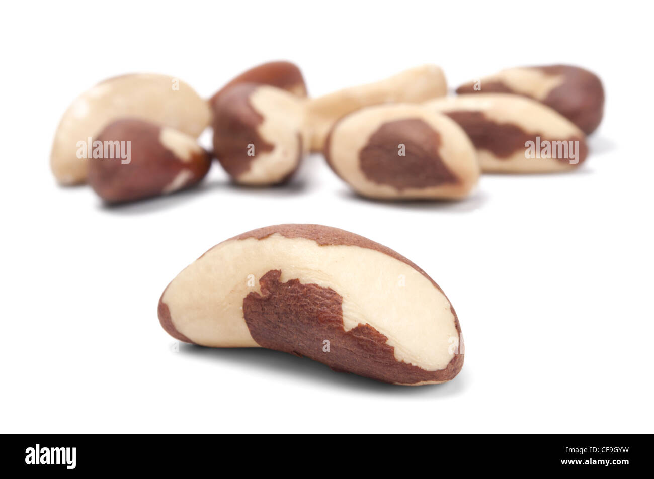Brazil nuts close-up isolated on white background Stock Photo - Alamy