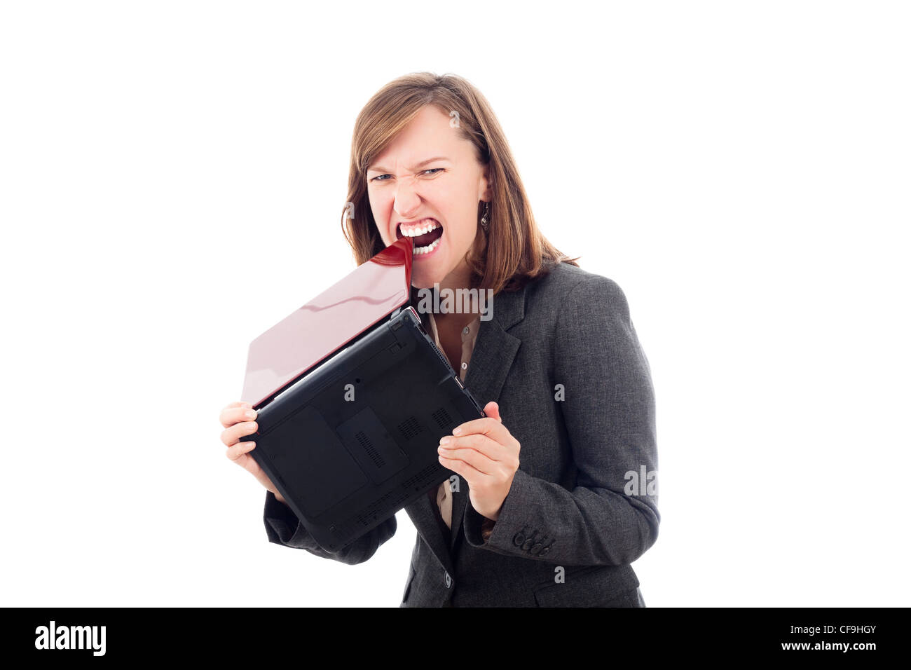 Frustrated woman biting her laptop hi-res stock photography and images ...