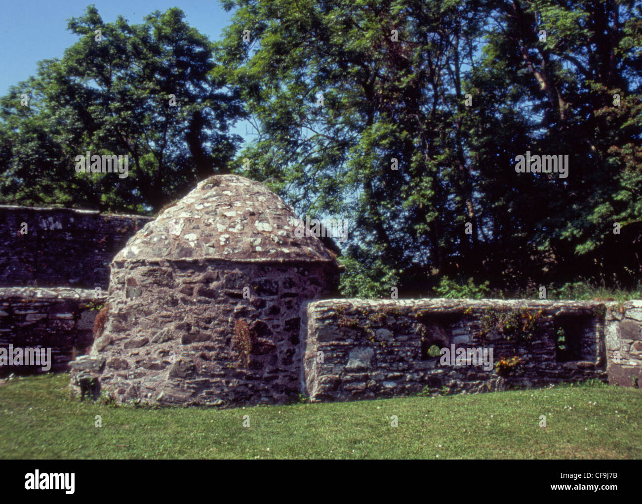 One of the four Holy Wells and a stone beehive at Struell Wells ...
