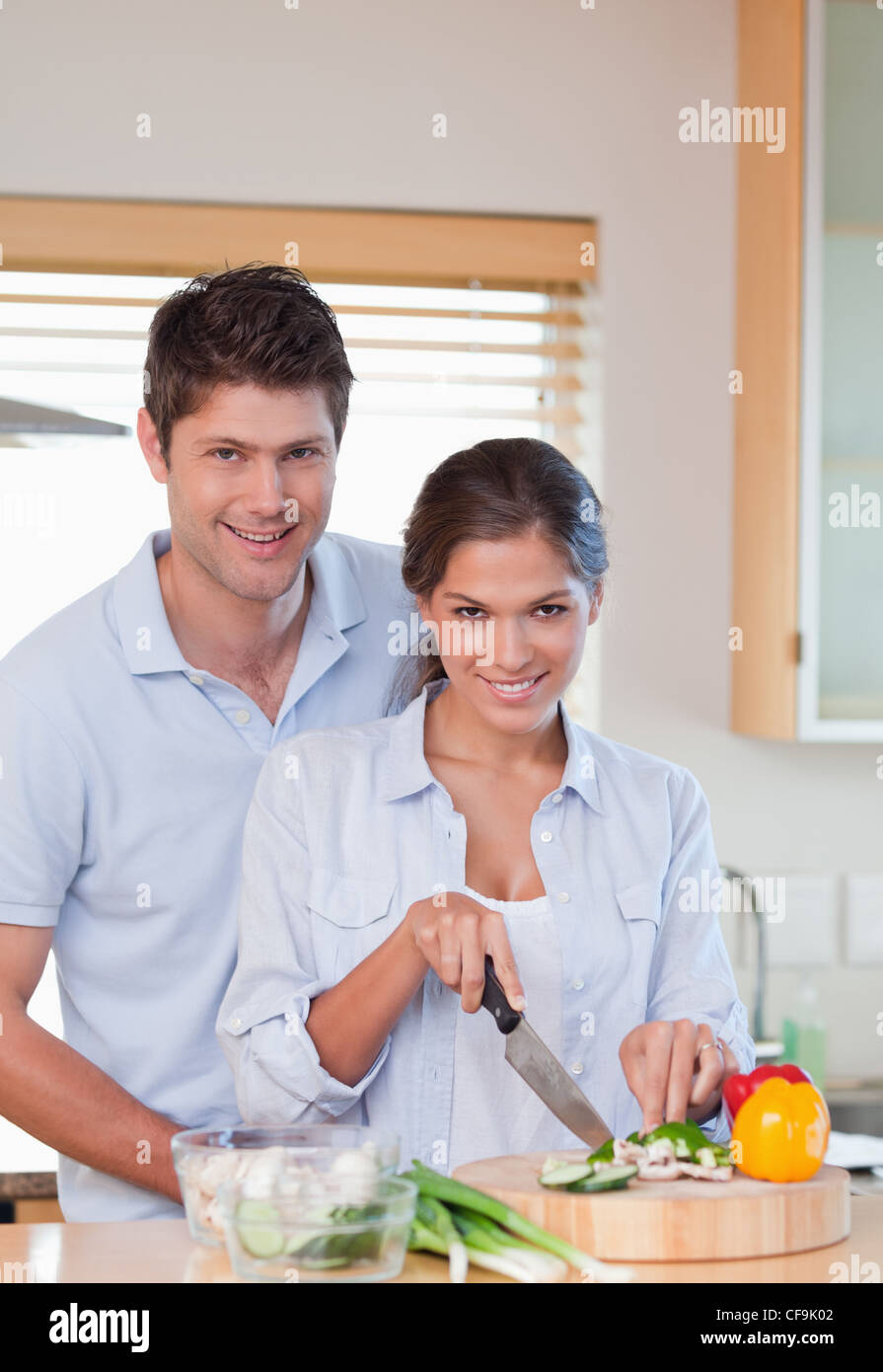Portrait of a couple cooking Stock Photo - Alamy