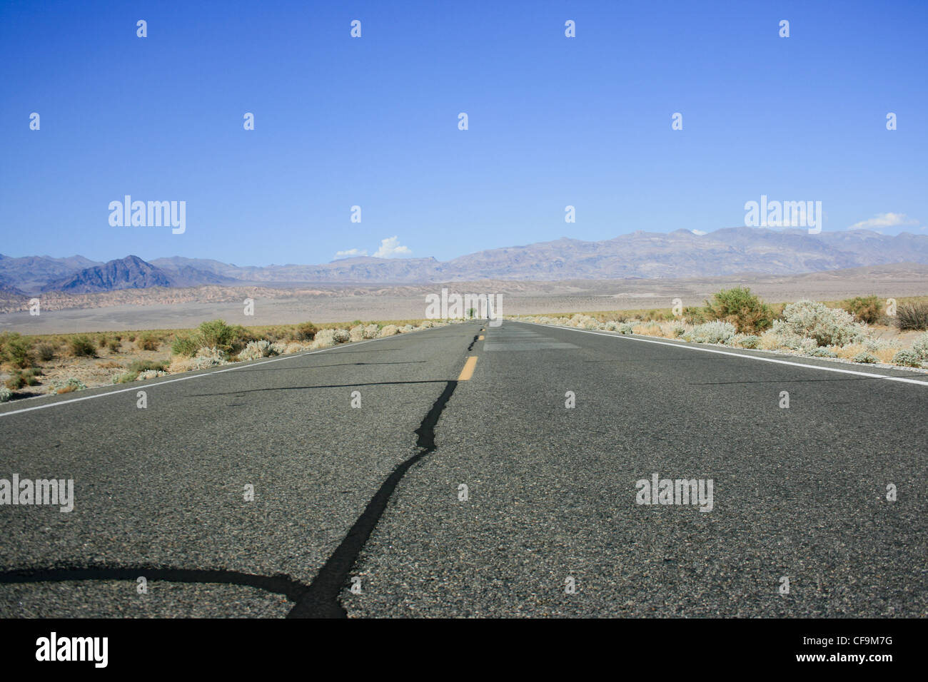 Flat road in the desert of Death Valley National Park, California Stock ...
