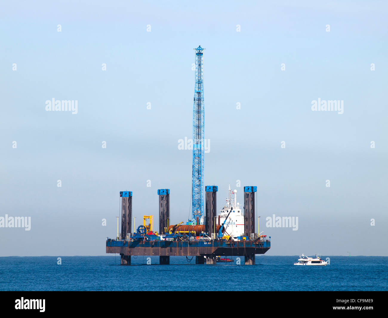 Jack-up construction vessel SEA JACK installing monopile foundations ...